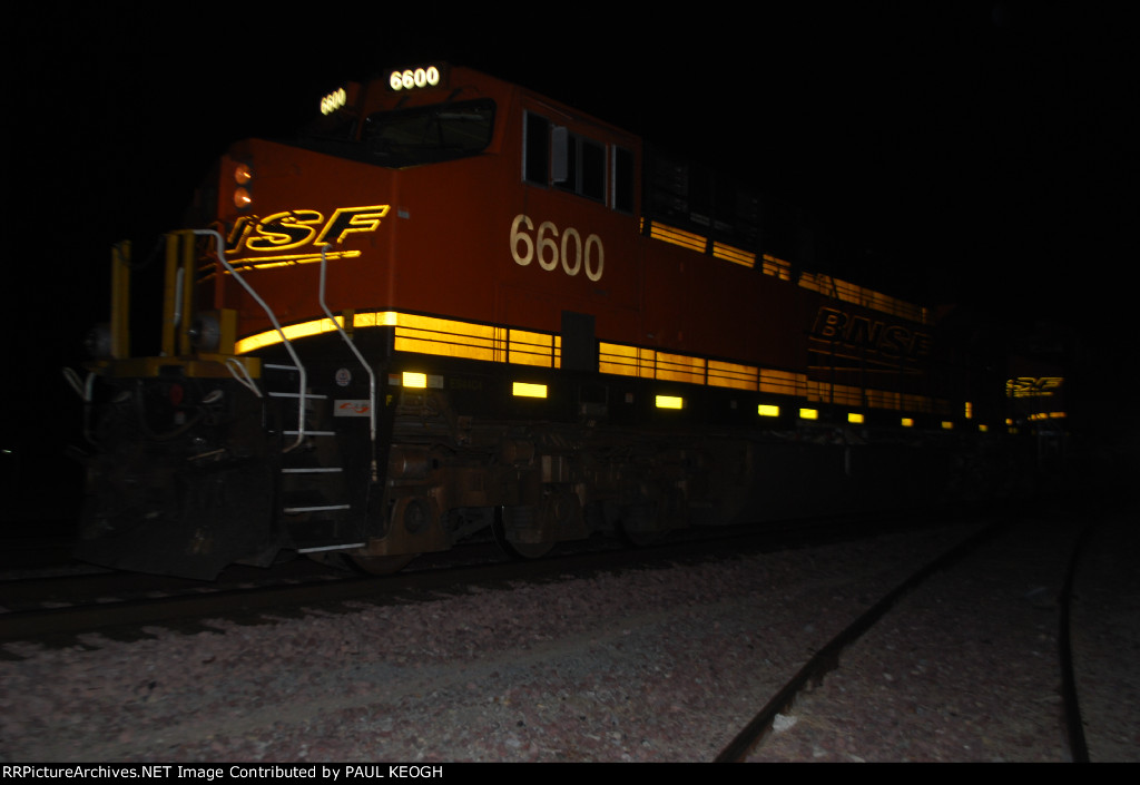 BNSF 6600 First ES44C4 lights up her BNSF Reflective logo as the rearmost DPU unit on a ...